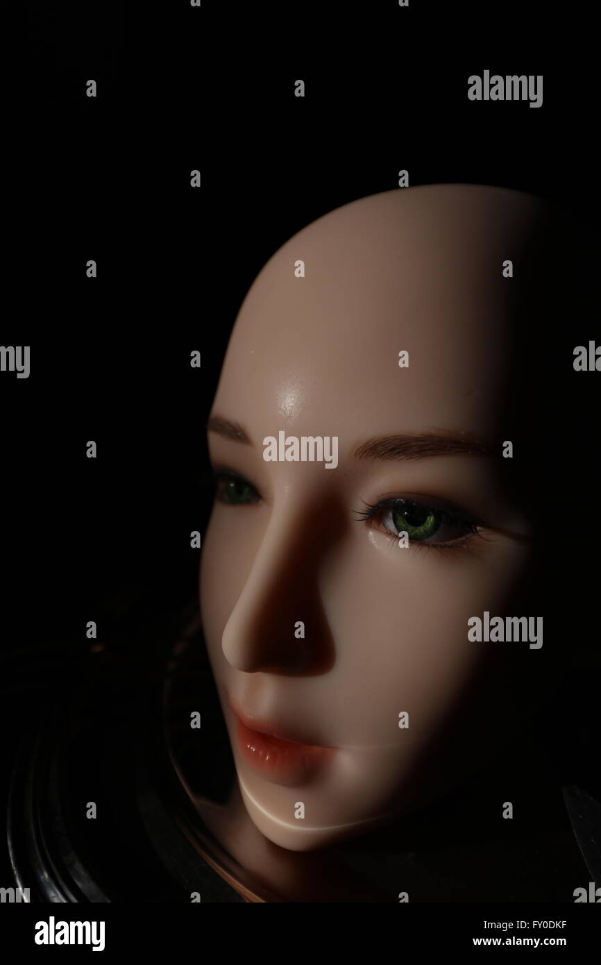 Solitaire silicone head on silver platter, black background Stock Photo ...