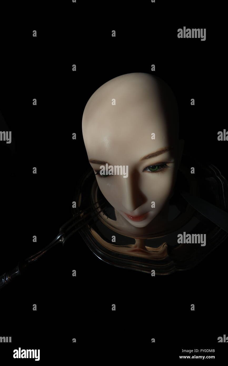 Solitaire silicone head on silver platter, black background Stock Photo ...