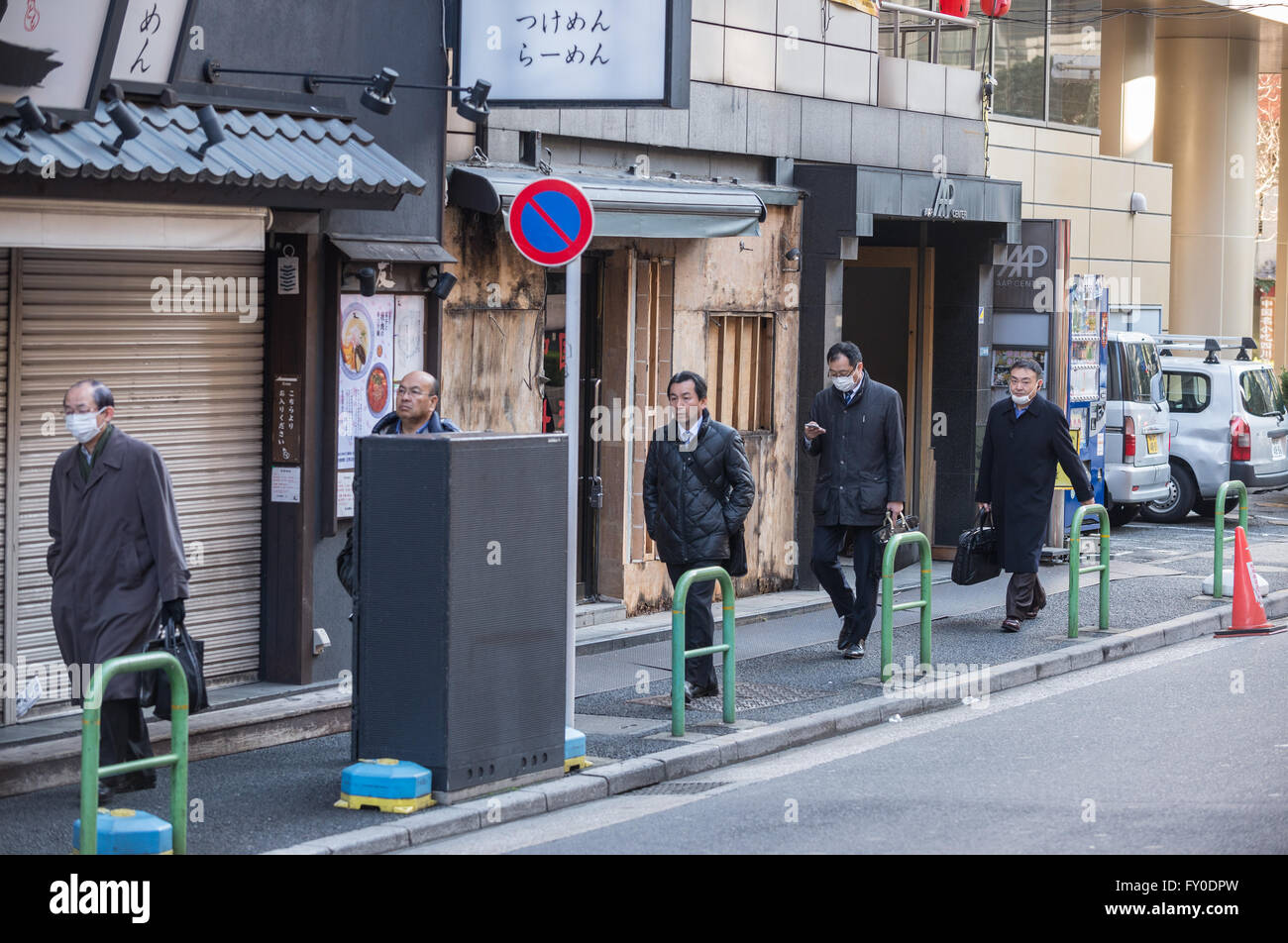 People on street in Akasaka district, Minato special ward, Tokyo city ...