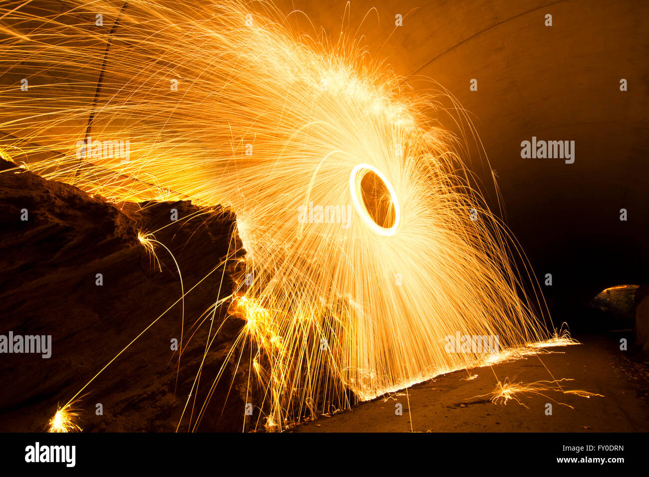 Steel Wool being spun inside a Tunnel Stock Photo - Alamy