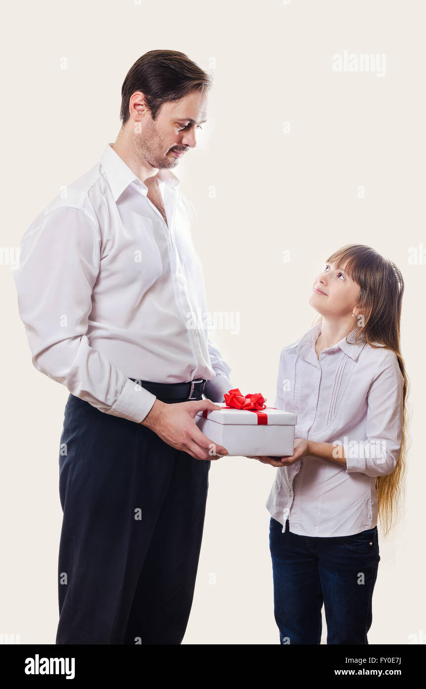 The father grants to the daughter a gift Stock Photo - Alamy