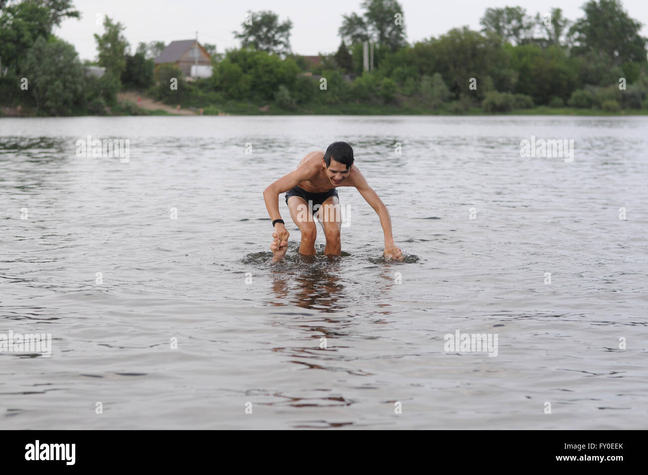 Teens swimming in the lake near the town of Kovrov, Russia Stock Photo ...