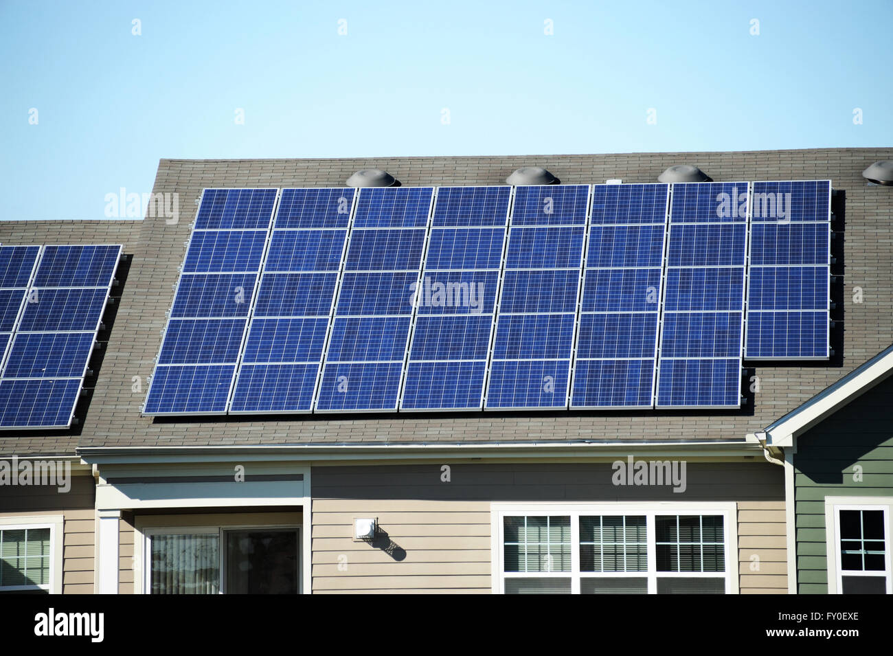 solar panel installed on the roof of apartment building Stock Photo - Alamy