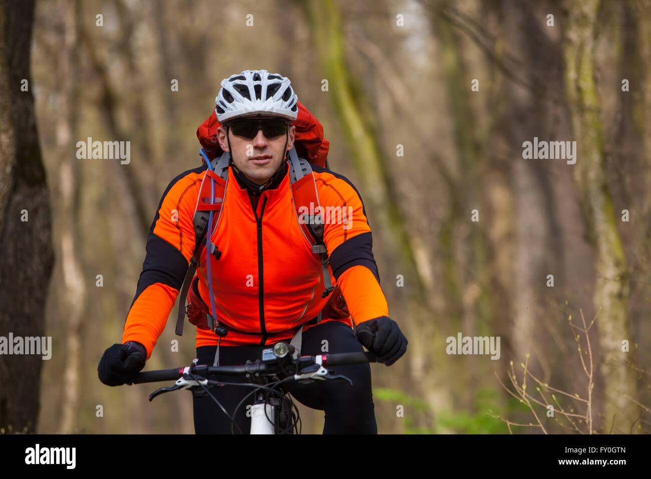 Man cyclist riding the bicycle Stock Photo - Alamy