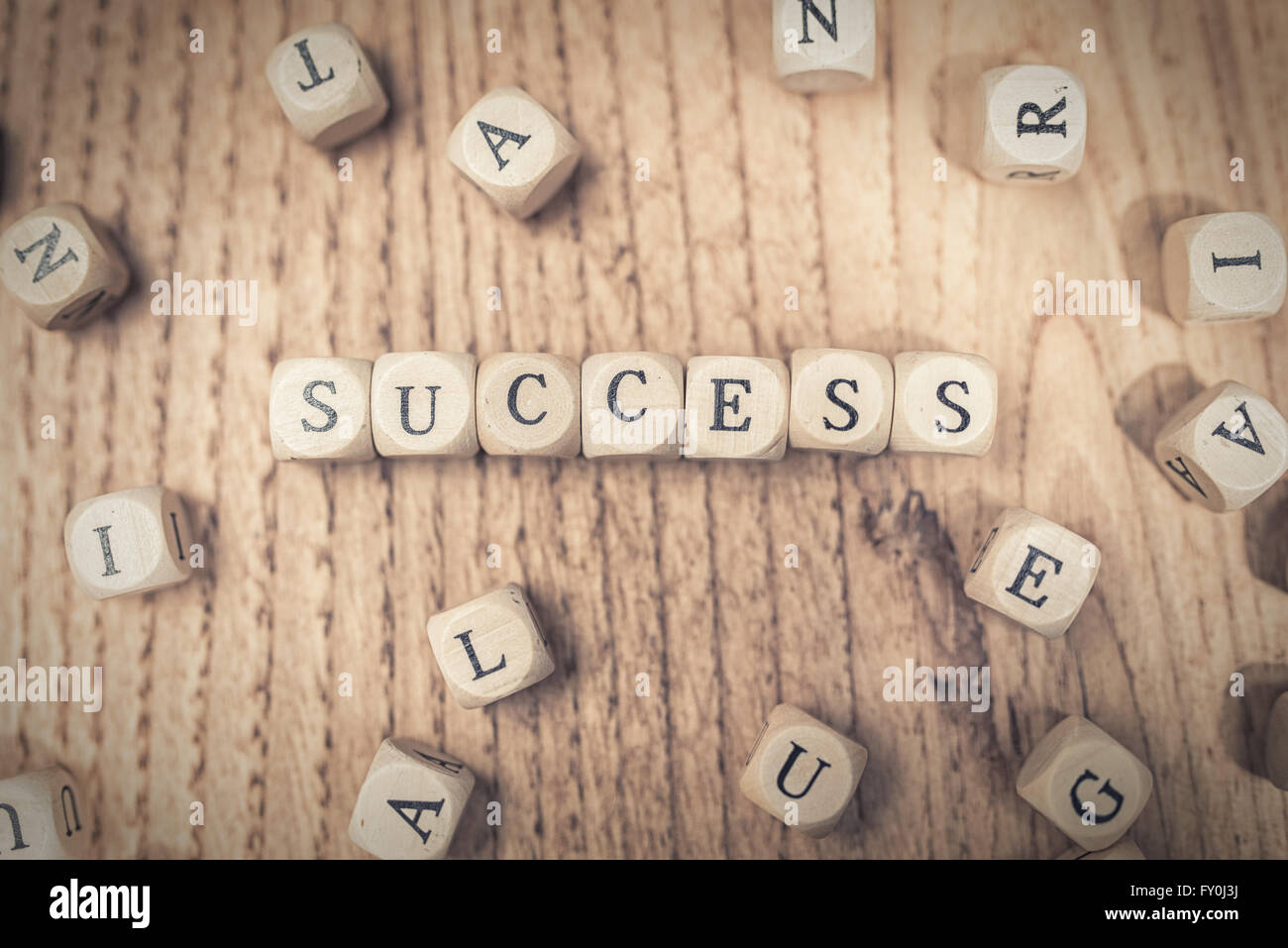 Success word on wood background Stock Photo - Alamy