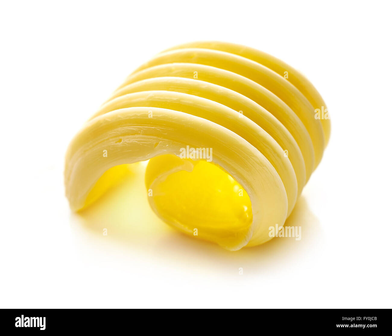 Fresh butter curl isolated on white background Stock Photo - Alamy