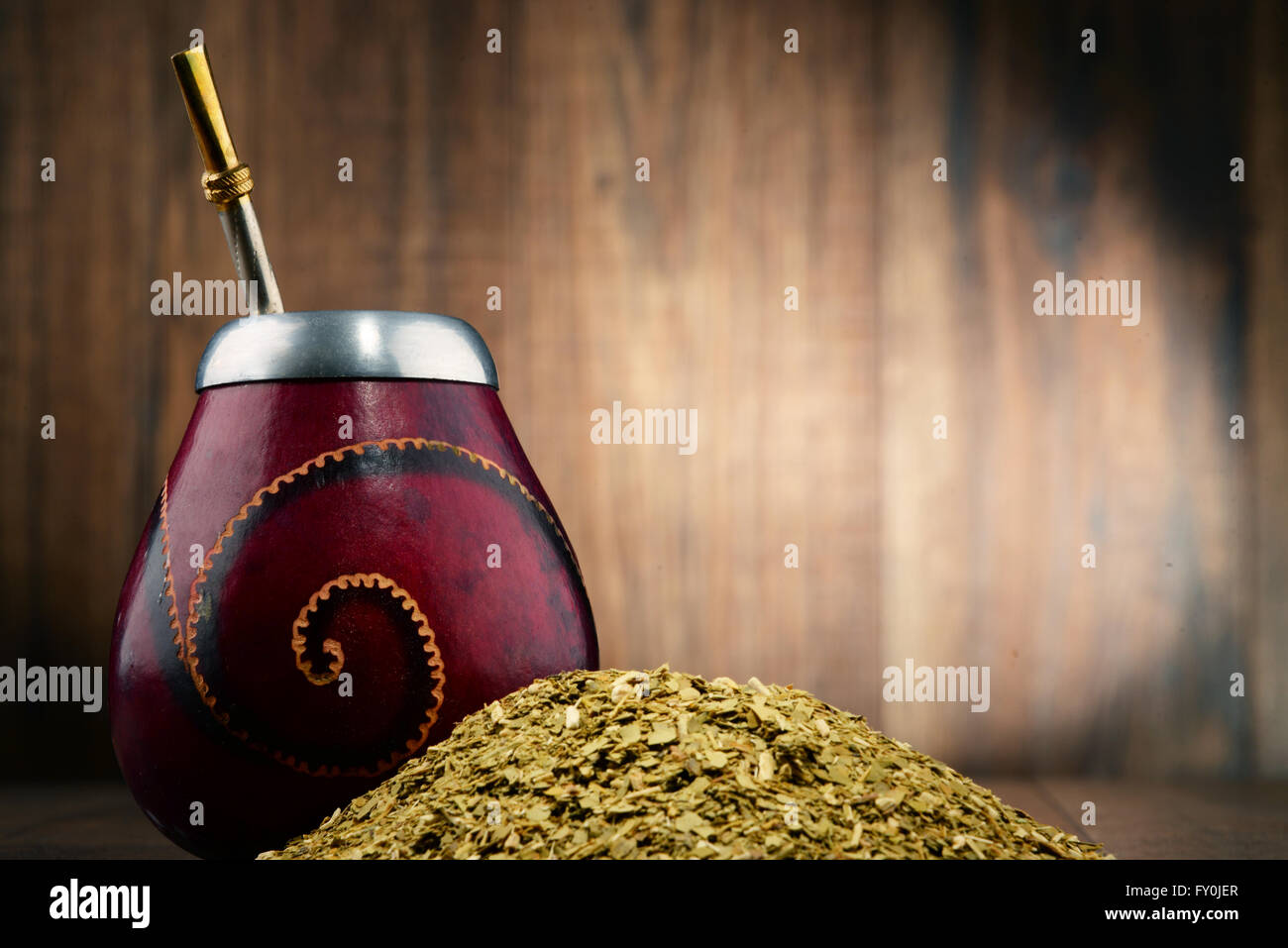 Composition with yerba mate cup and leaves Stock Photo - Alamy