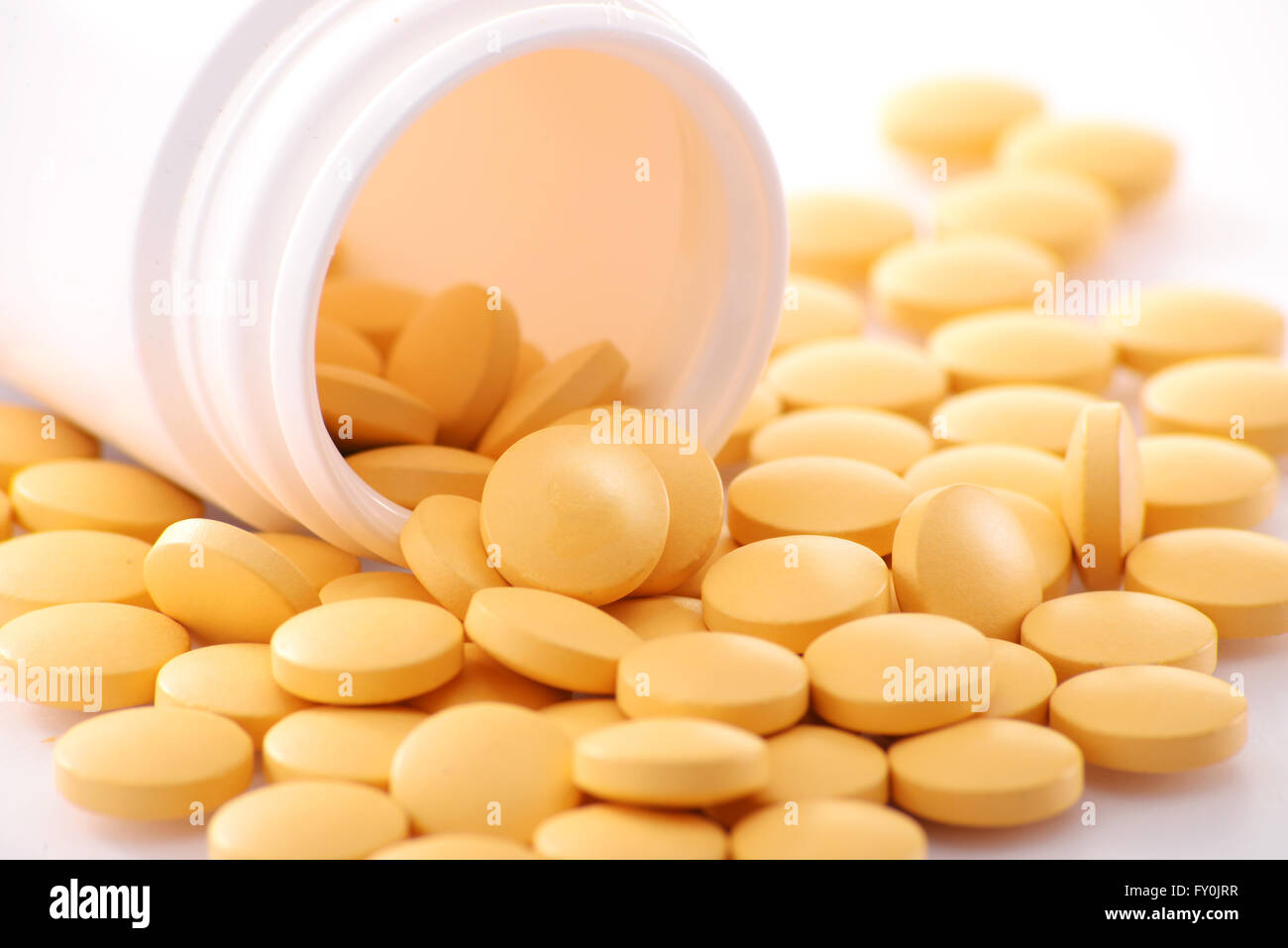 Composition with variety of drug pills and container Stock Photo - Alamy