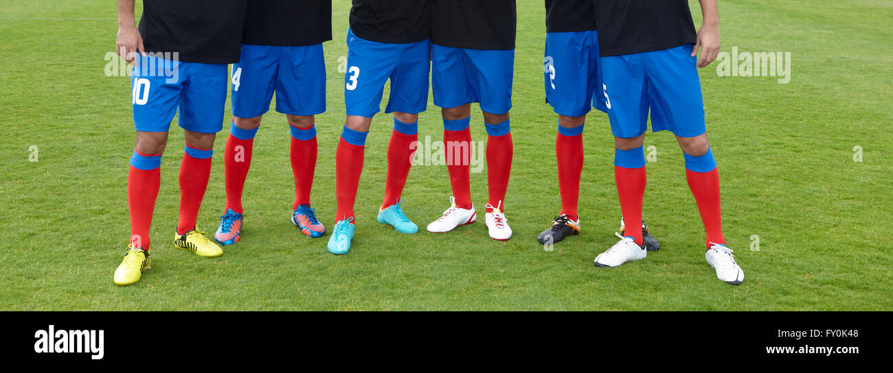 Five football players in the ground. Horizontal format Stock Photo - Alamy