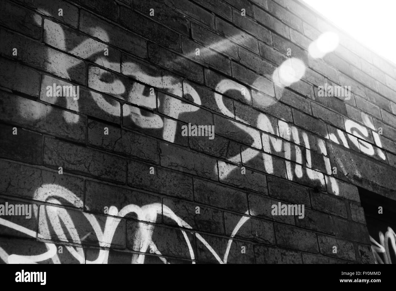'Keep Smiling' graffiti Stock Photo - Alamy