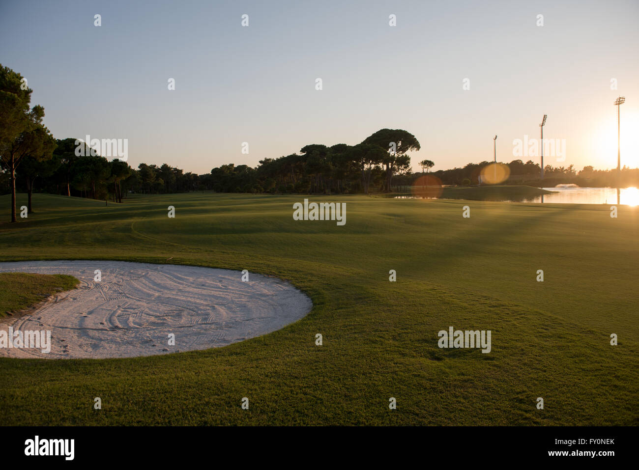 golf course landscape at beautiful sunset Stock Photo - Alamy