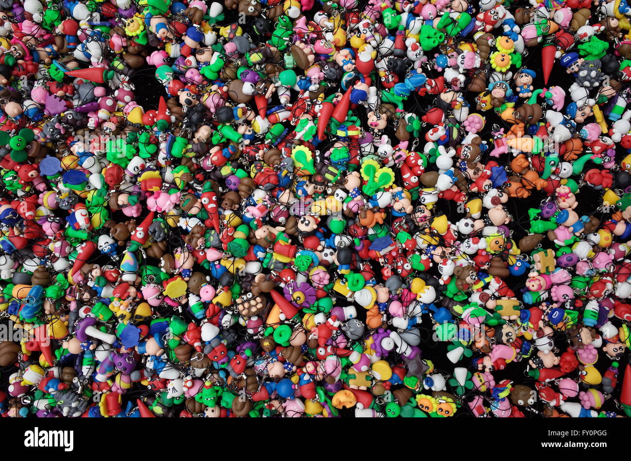 Abstract of small multi-coloured child's toys Stock Photo - Alamy