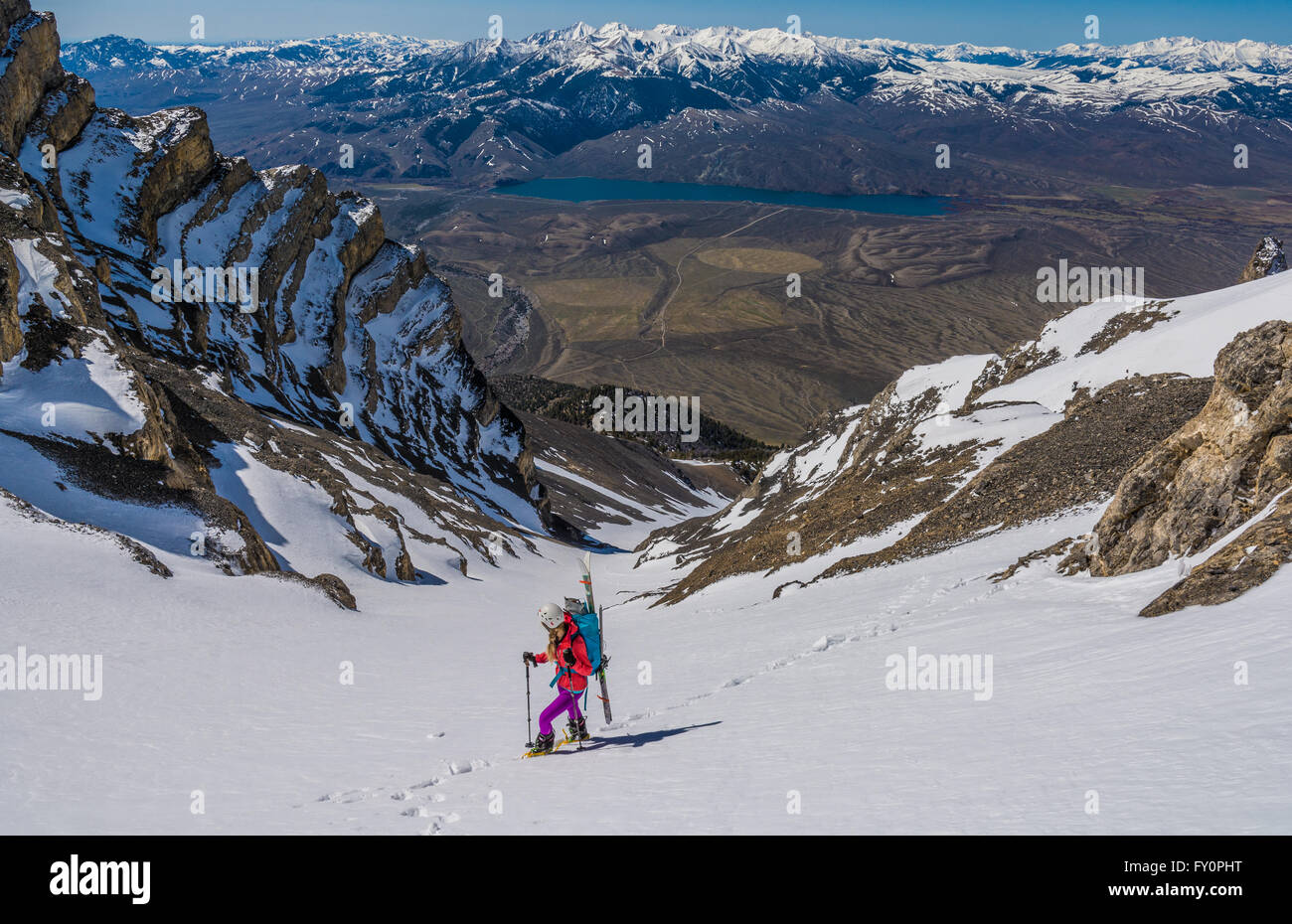Ski mountaineer ascending to the summit of the "Super Gully" on Lost ...