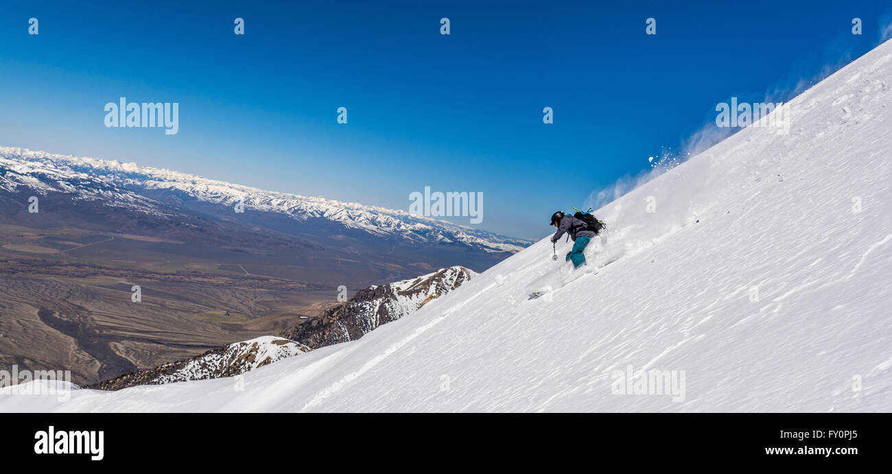 Ski mountaineer descending from the summit of the "Super Gully" on Lost ...