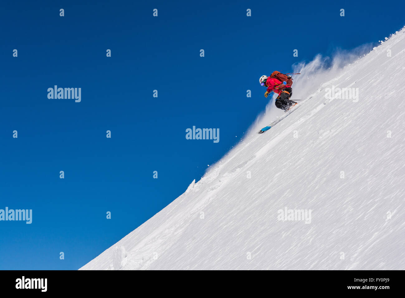 Ski mountaineer descending from the summit of the "Super Gully" on Lost ...