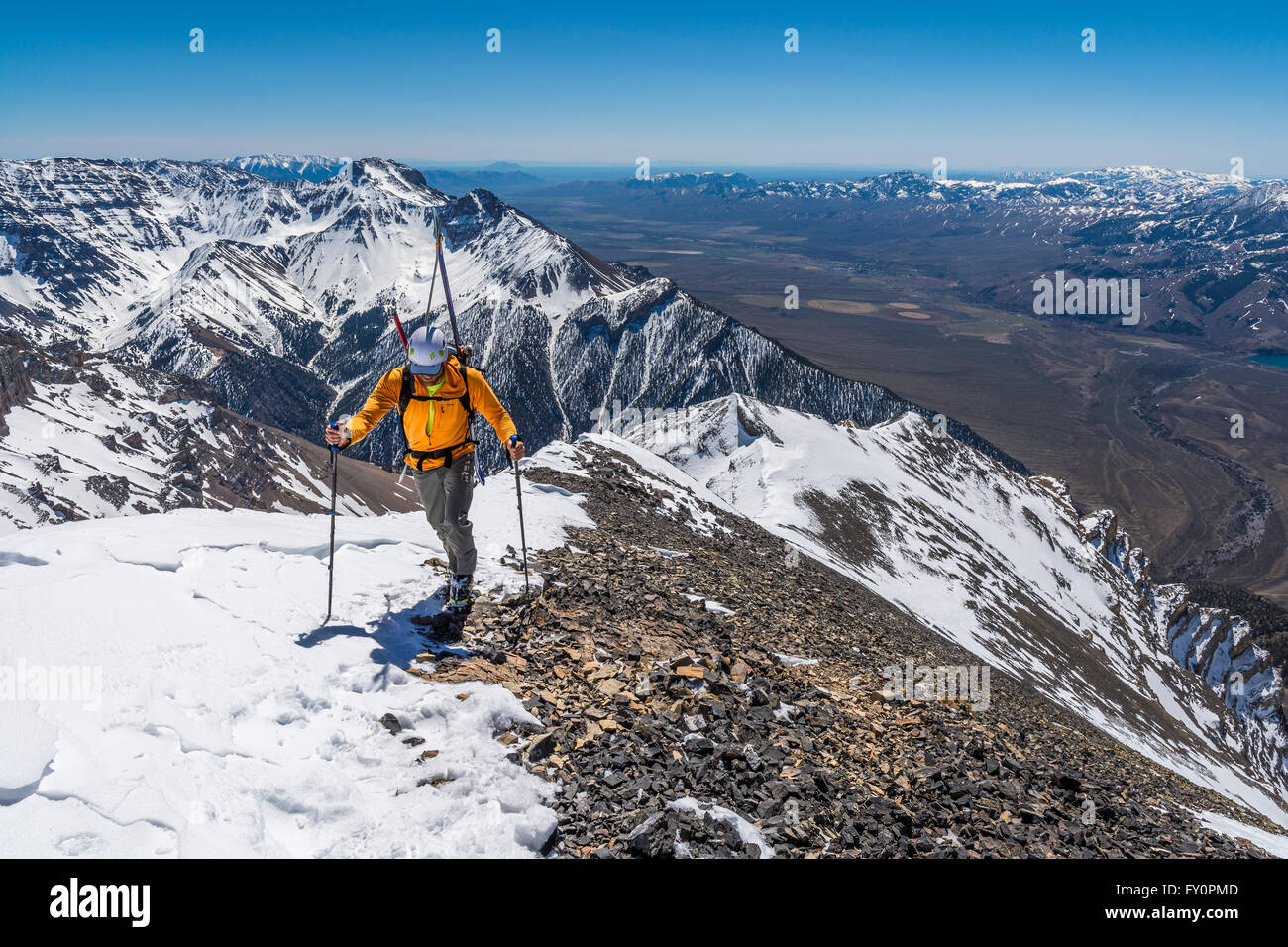 Ski mountaineer ascending to the summit of the "Super Gully" on Lost ...