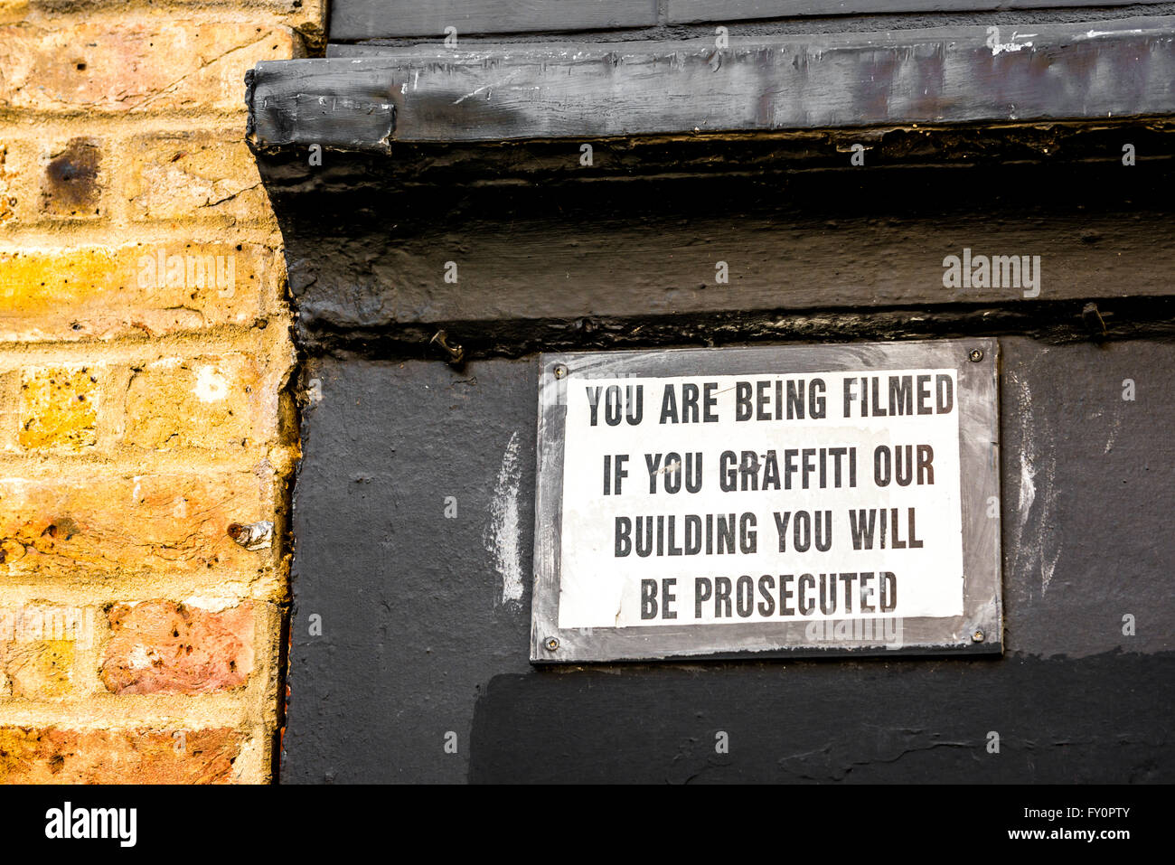 Stop sign graffiti hi-res stock photography and images - Alamy