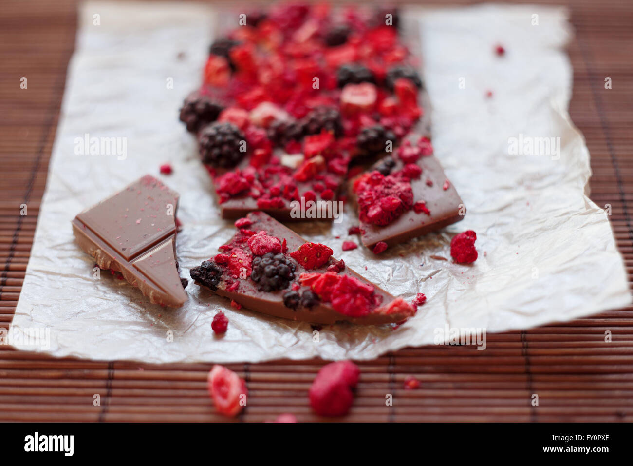 Handmade chocolate with fresh and dried berries, raspberries ...