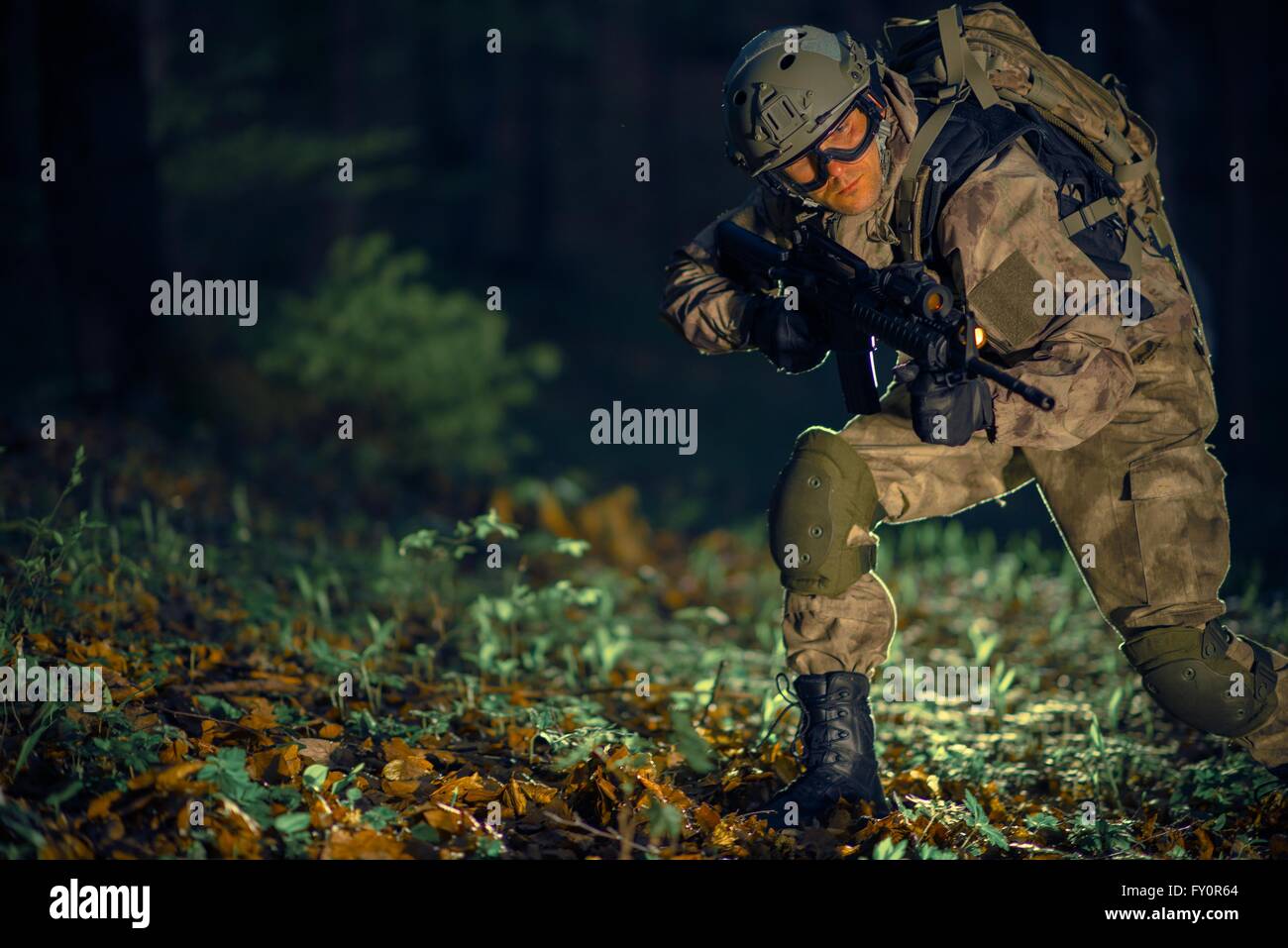 Night Time Special Operation. Running Troop Soldier with Assault Rifle ...