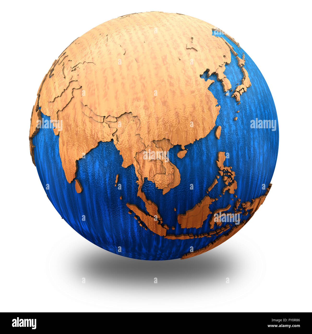 Southeast Asia on wooden model of planet Earth with embossed continents ...