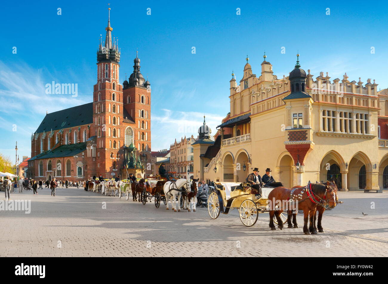 Horse carriage waiting for tourists, Market Square, Cracow Old Town ...