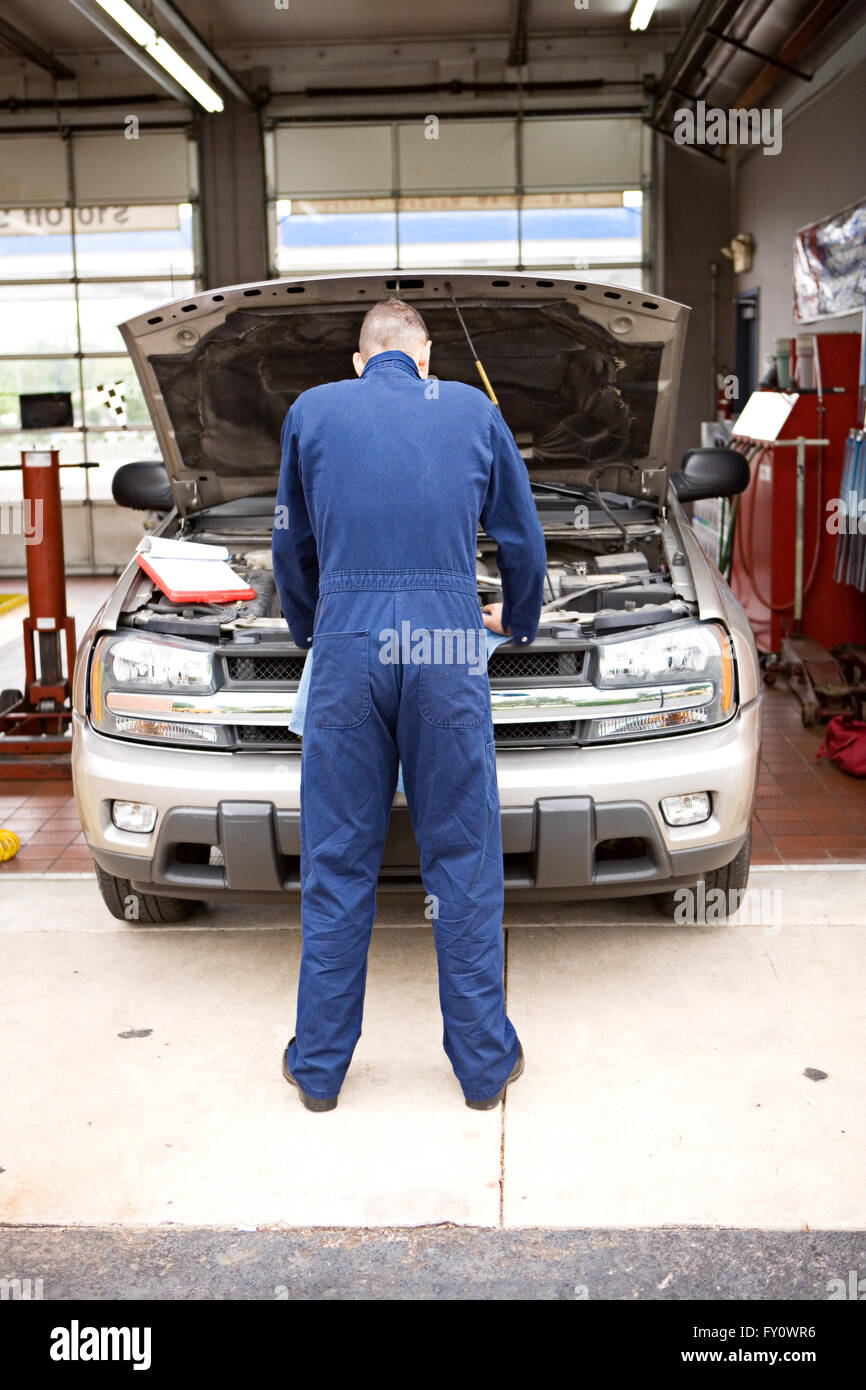 Extensive series of a woman who has taken her car to the auto service ...