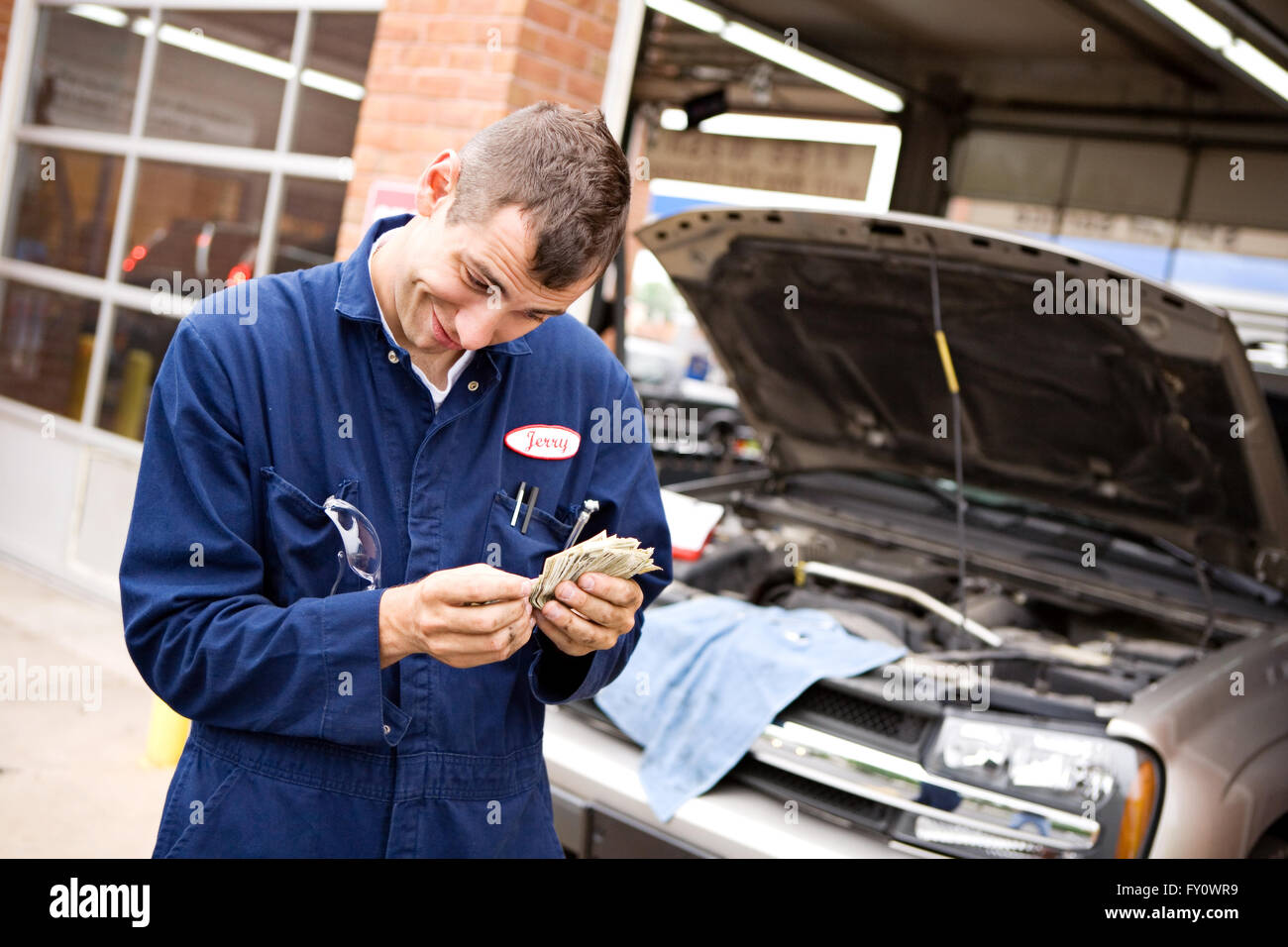 Extensive series of a woman who has taken her car to the auto service ...