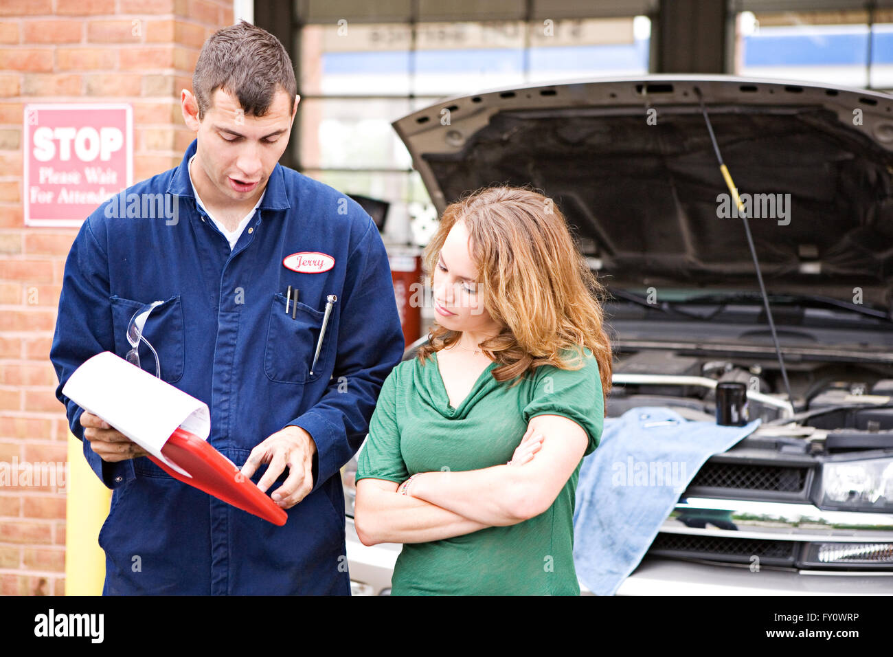 Extensive series of a woman who has taken her car to the auto service ...