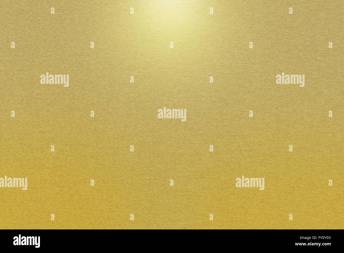 Pattern of brushed gold metal background. Subdued light is in the upper ...
