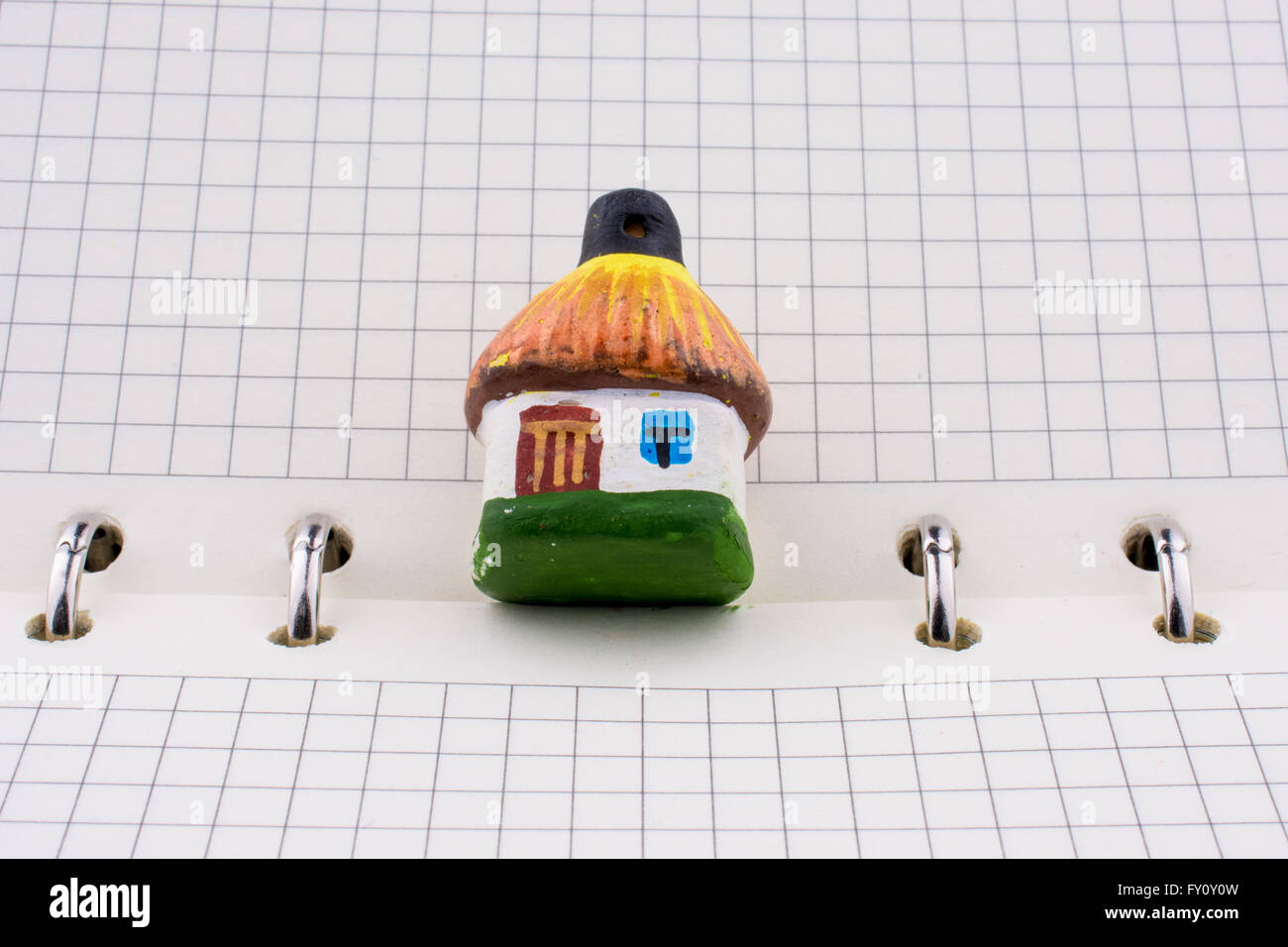 Hut model on a spiral notebook Stock Photo - Alamy