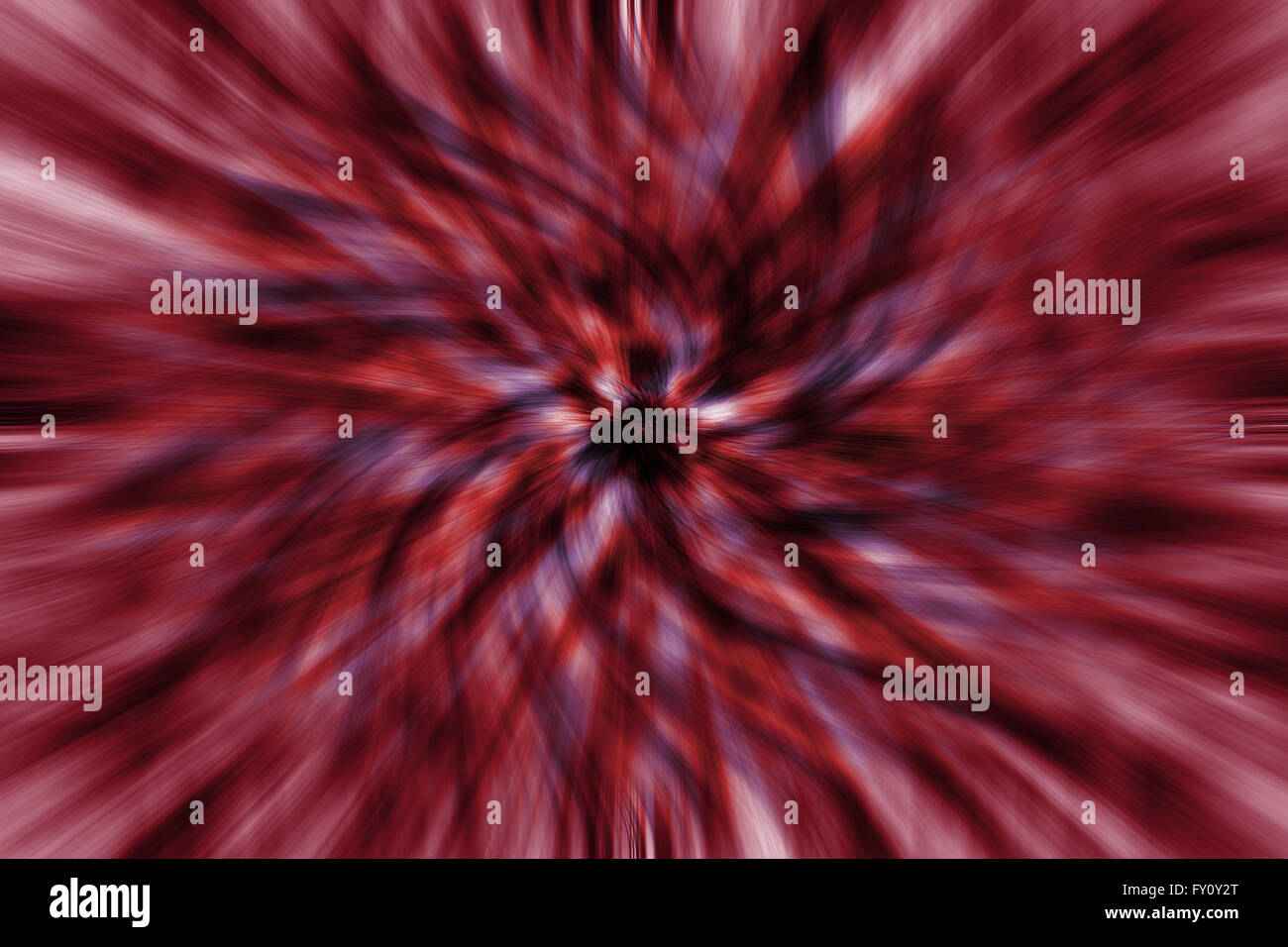 Red and dark vortex blurred background. The vortex is directed to the ...