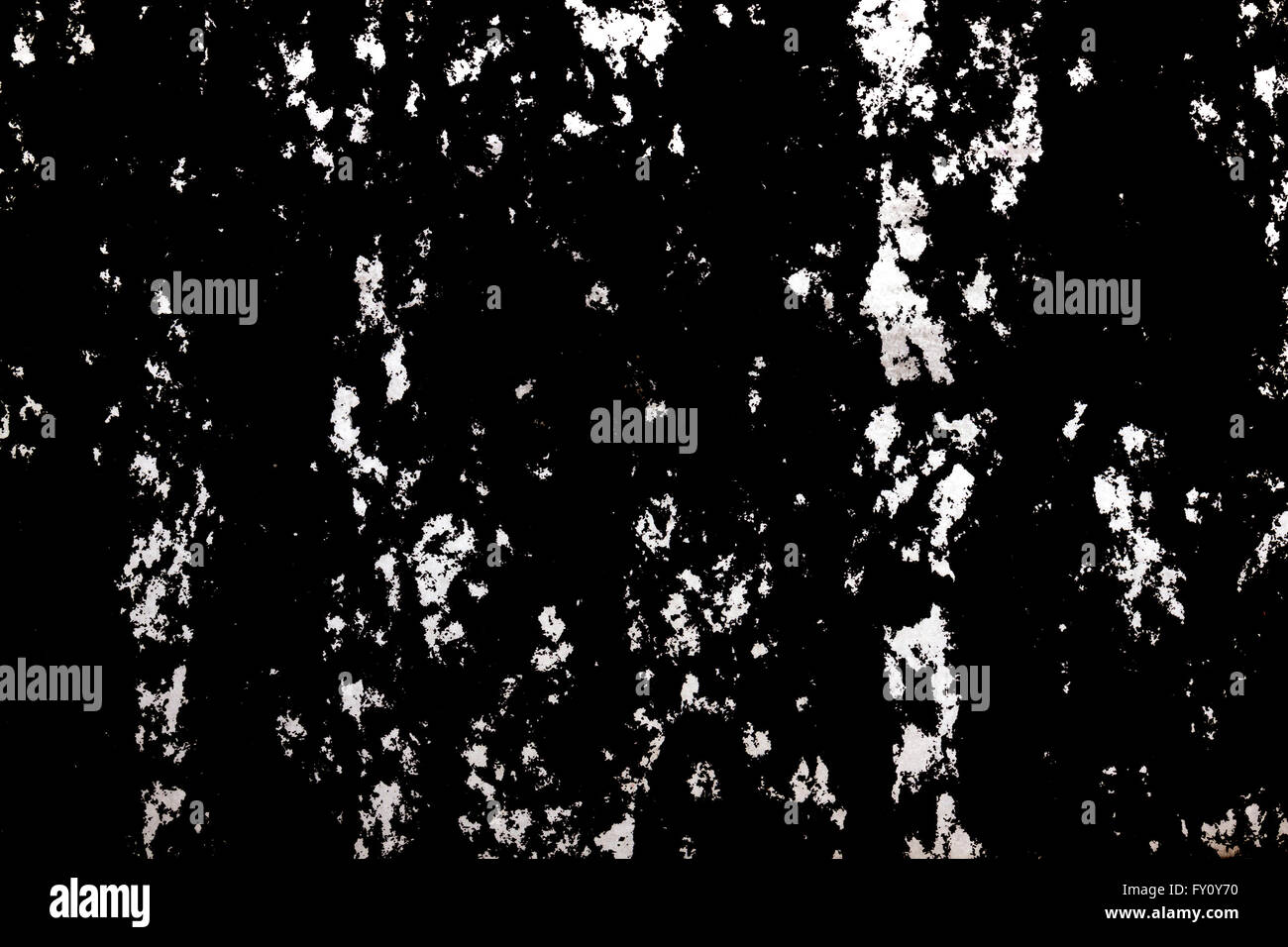 Closeup abstract background of black and white patches and blotches ...