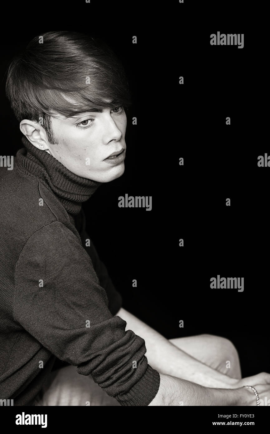 Young male with thin face and high cheek bones head and shoulders in ...