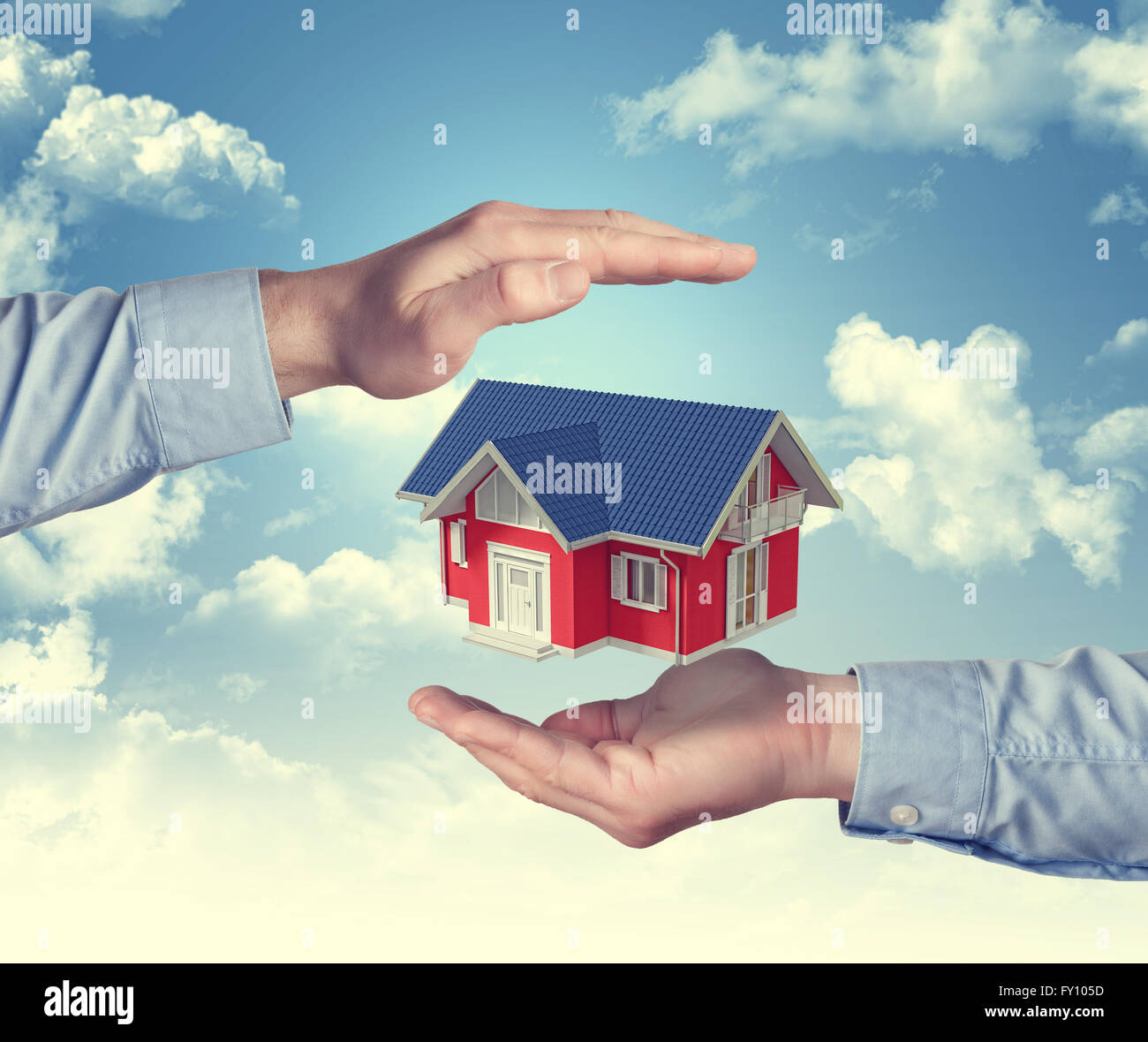 classic house model and hands Stock Photo - Alamy