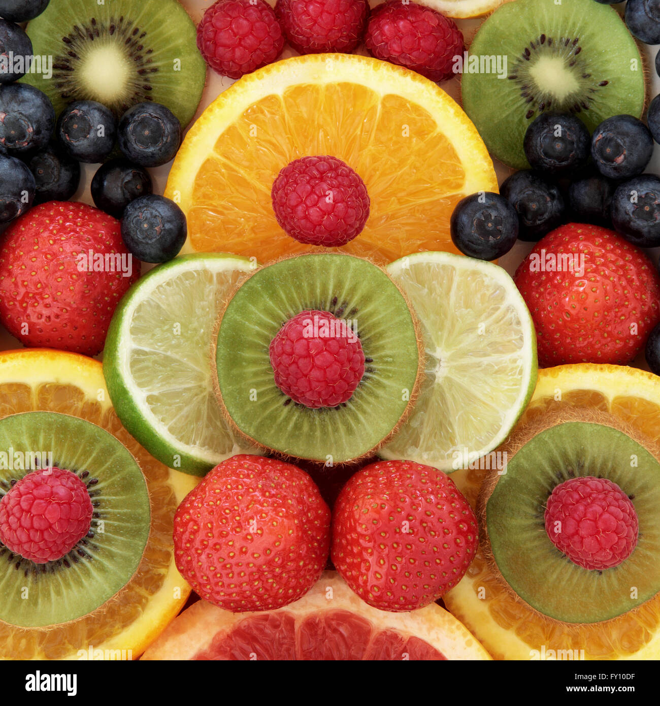 Fruit selection in abstract design forming a background Stock Photo - Alamy