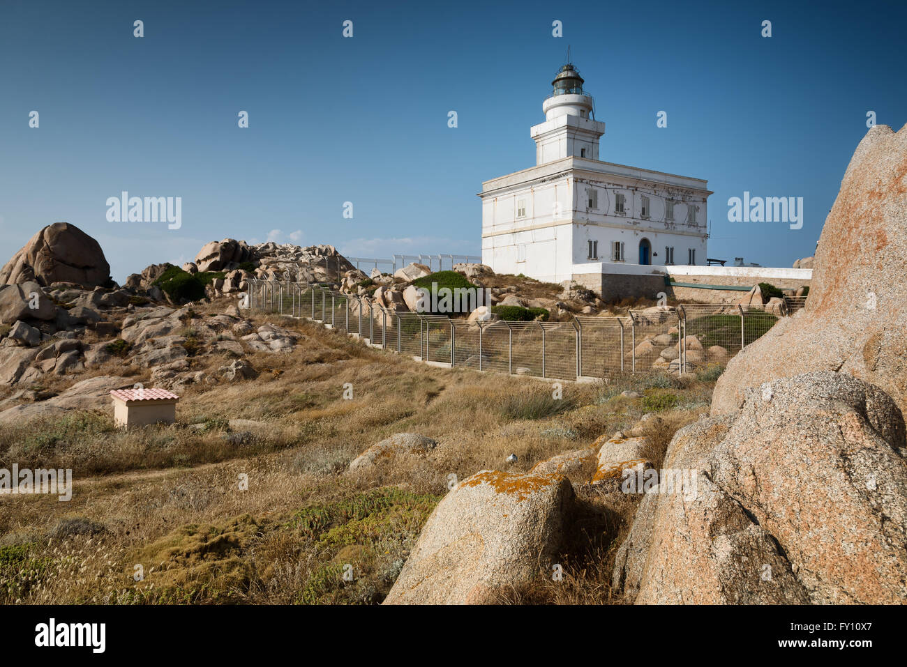 White lighthouse at Capo Testa, Sardinia, Italy Stock Photo - Alamy