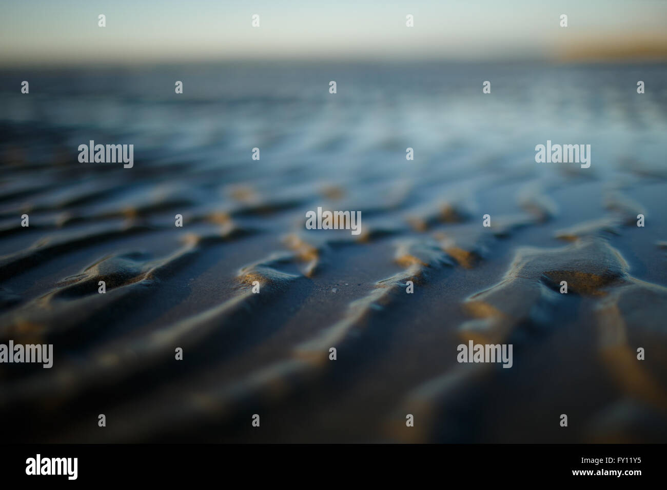 Ripples in sand on a beach Stock Photo - Alamy