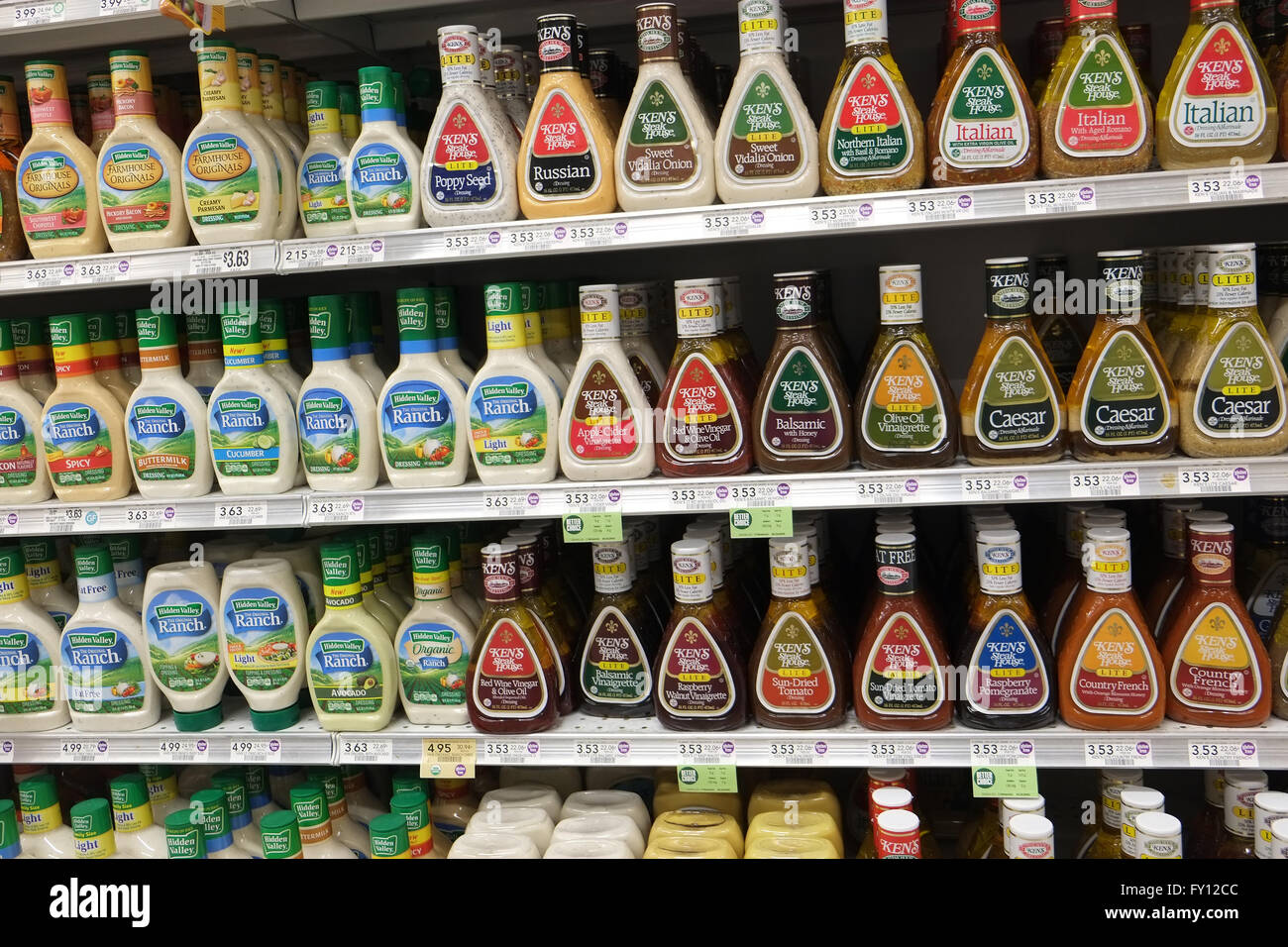Well stocked shelves of sauces and mayonnaise in a supermarket in ...