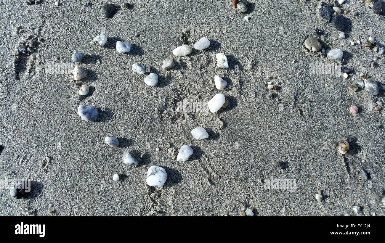 Sunny beach and the heart hi-res stock photography and images - Alamy