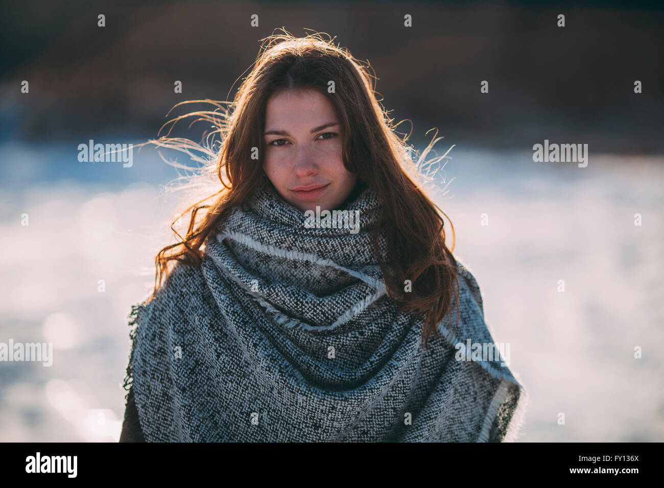 Portrait of young beautiful woman standing outdoors Stock Photo - Alamy