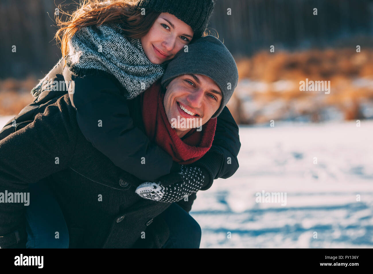Giving piggyback ride hi-res stock photography and images - Alamy
