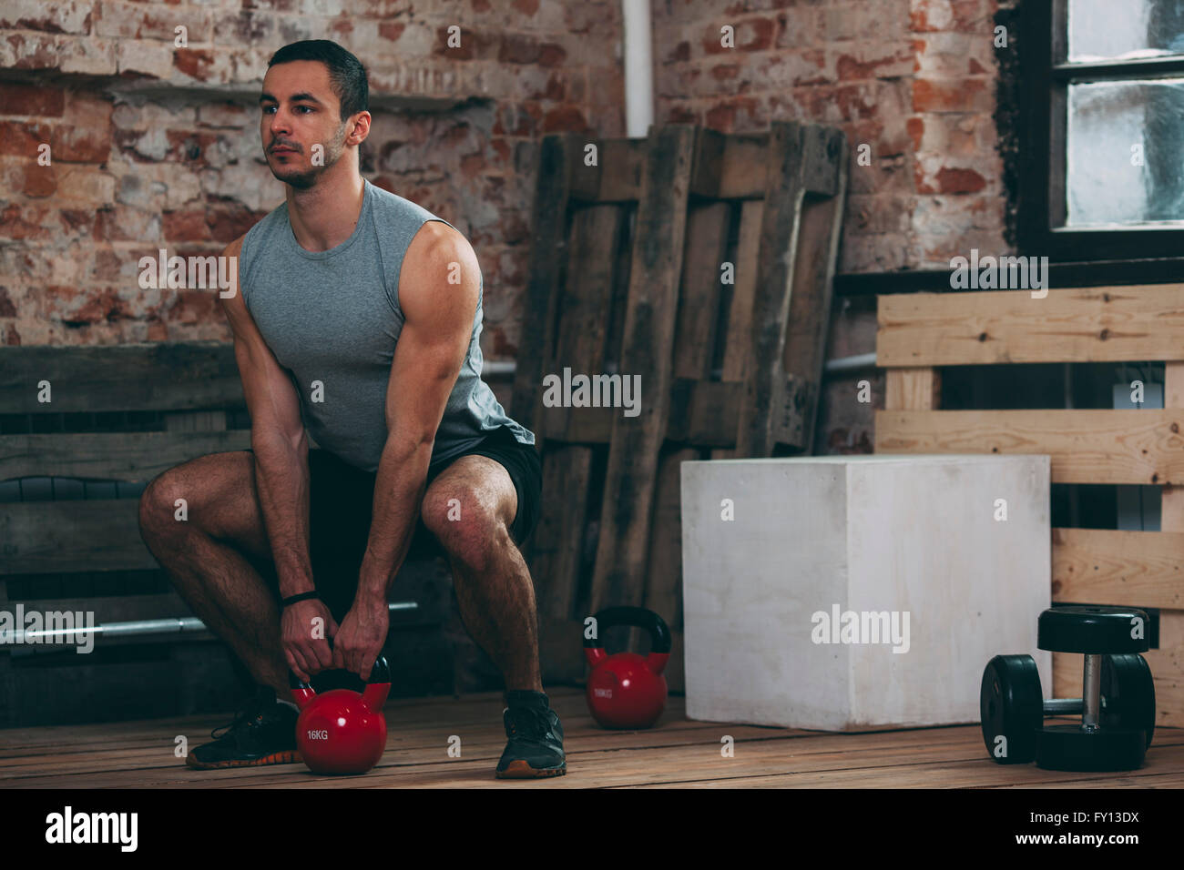 Man lifting weights at gym hi-res stock photography and images - Alamy