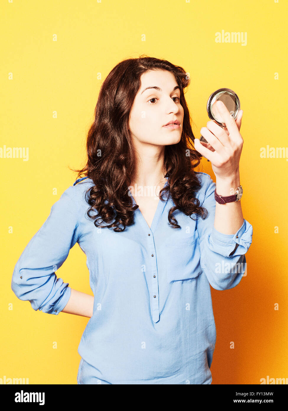 Woman looking into a mirror hi-res stock photography and images - Alamy