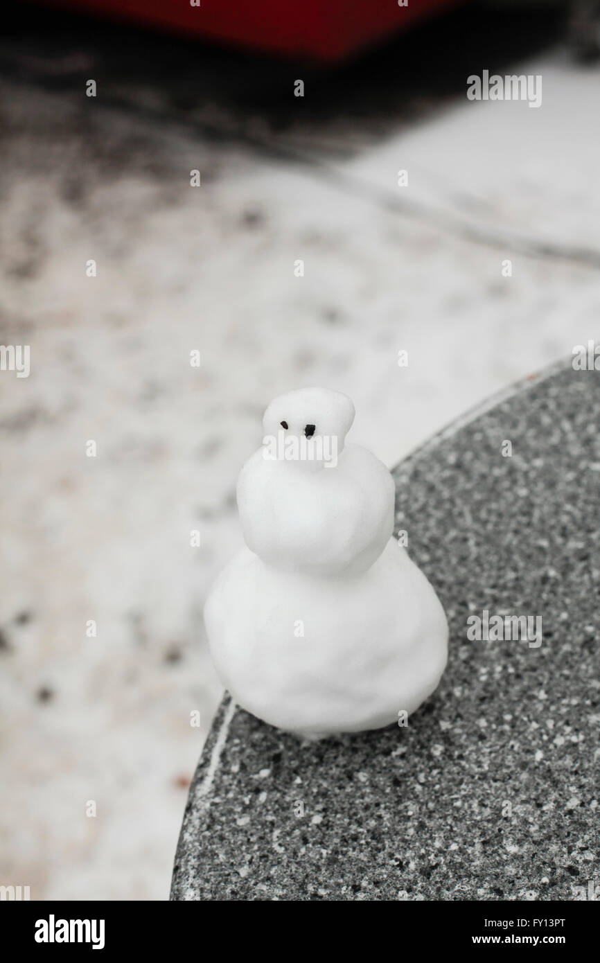 Close-up of small snowman on table Stock Photo - Alamy