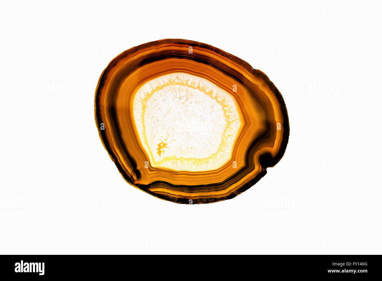 Cross section of orange agate stone against white background Stock ...