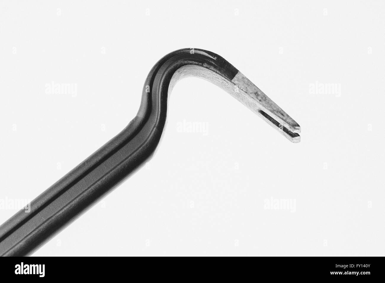 Close-up of crowbar against white background Stock Photo - Alamy