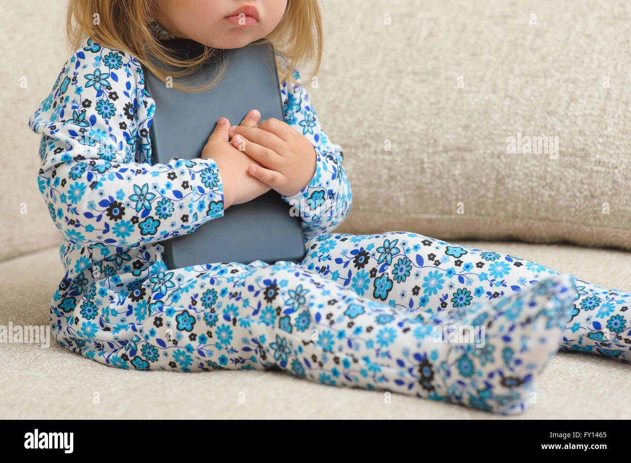 Baby with tablet computer Stock Photo - Alamy