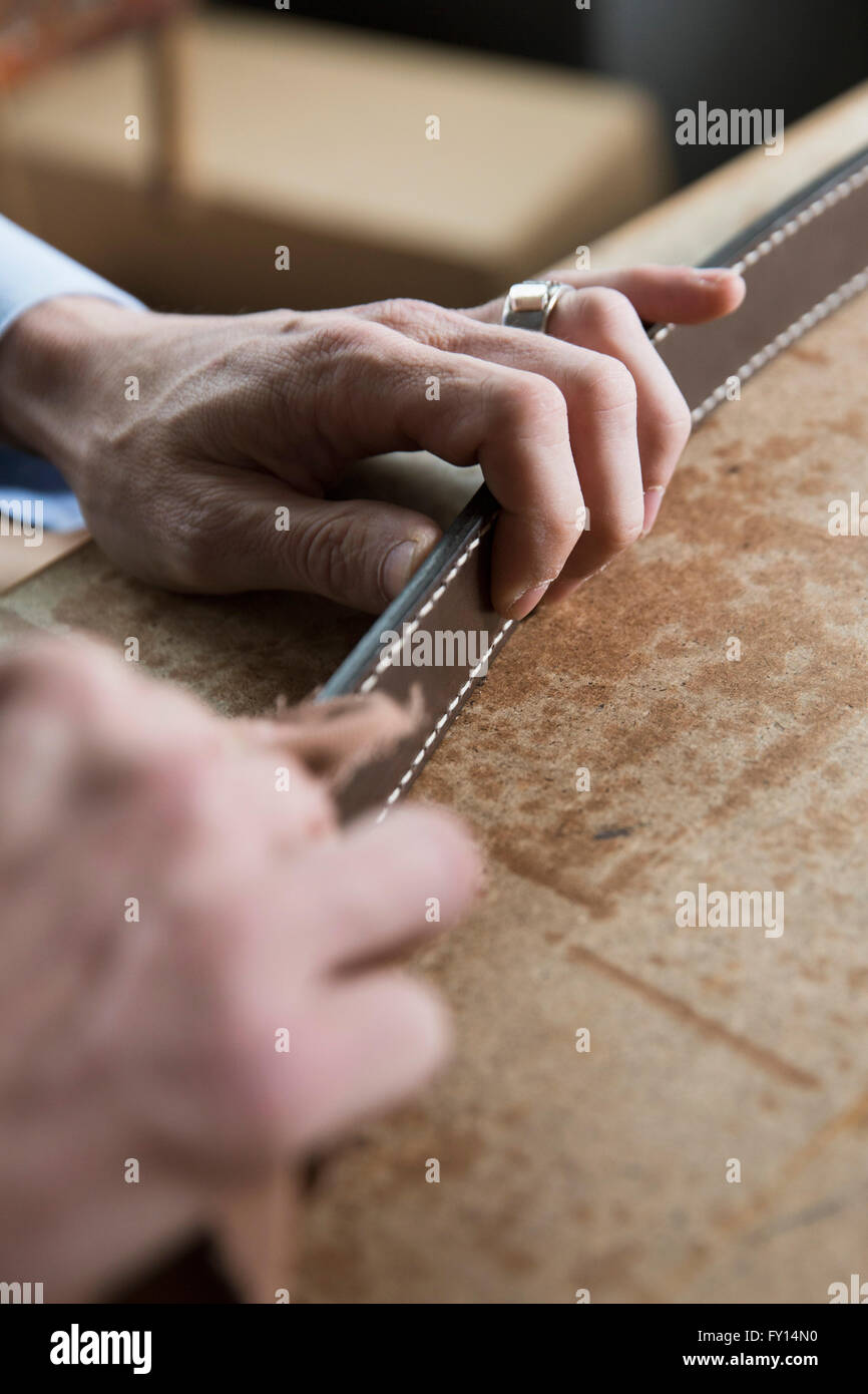 Hand holding belt hi-res stock photography and images - Alamy