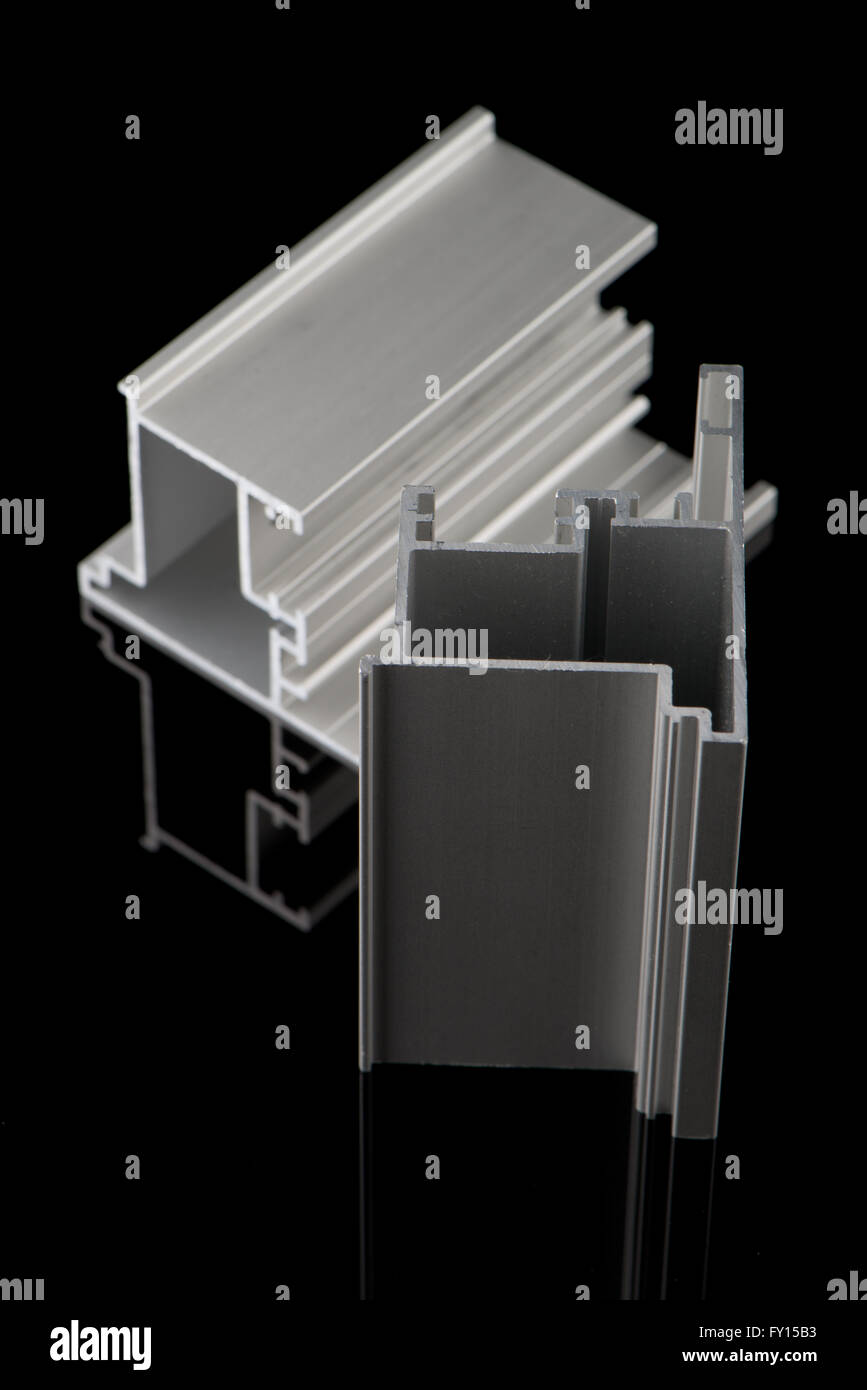 Aluminium profile sample isolated on black background Stock Photo - Alamy
