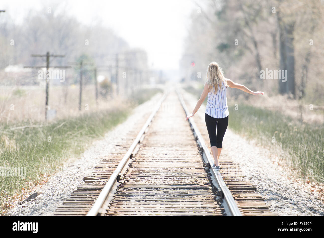 Blonde girl walking outside hi-res stock photography and images - Alamy